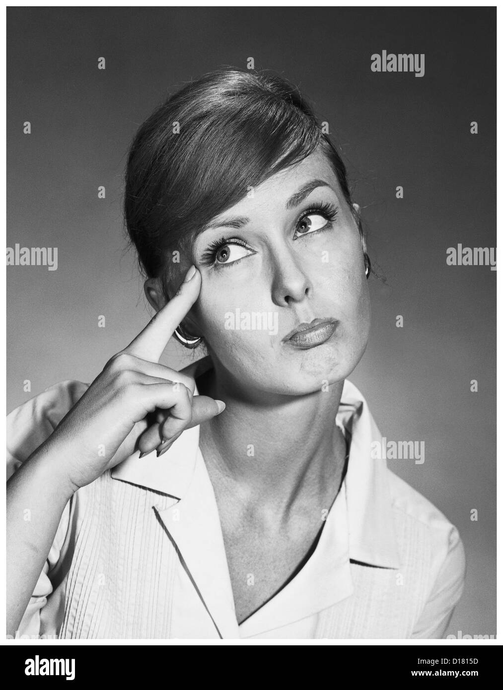 Portrait of a Woman thinking Stock Photo - Alamy