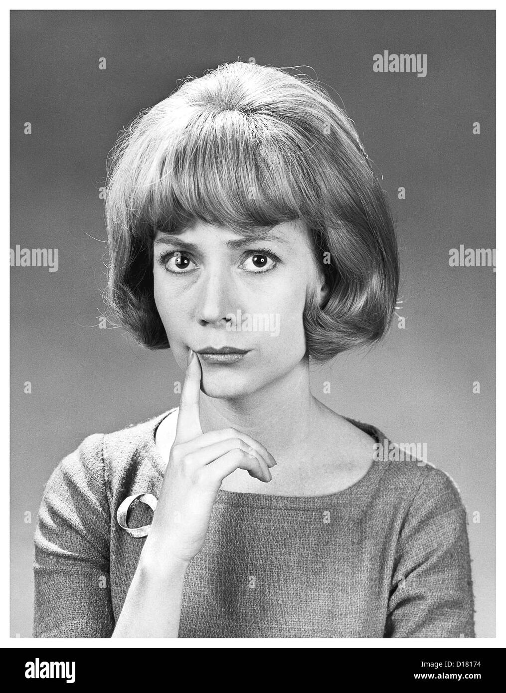 Portrait of a woman thinking Stock Photo - Alamy