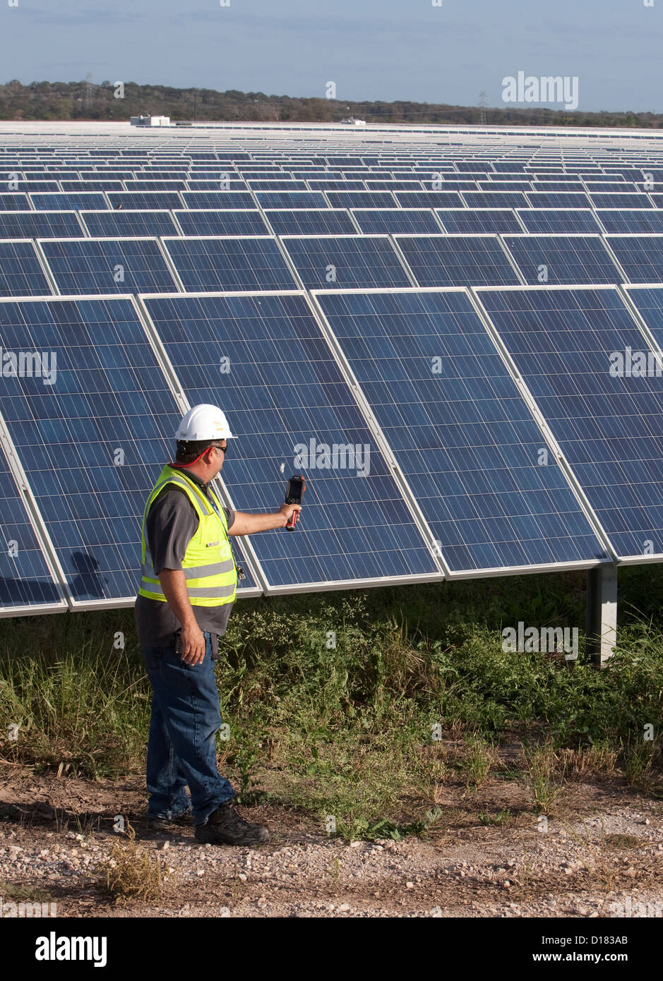 White male uses thermal imaging camera to perform quality control and ...