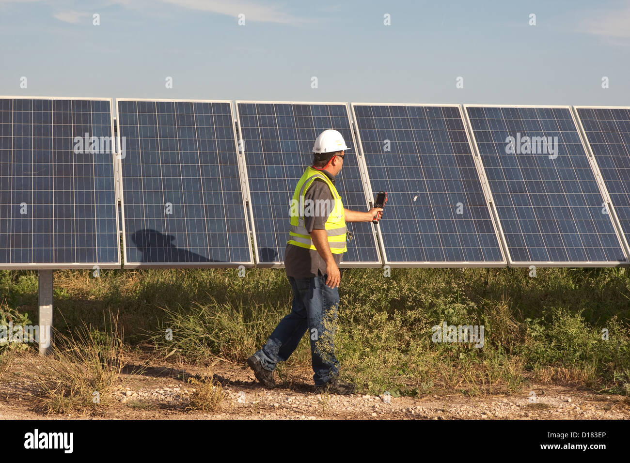 White male uses thermal imaging camera to perform quality control and ...