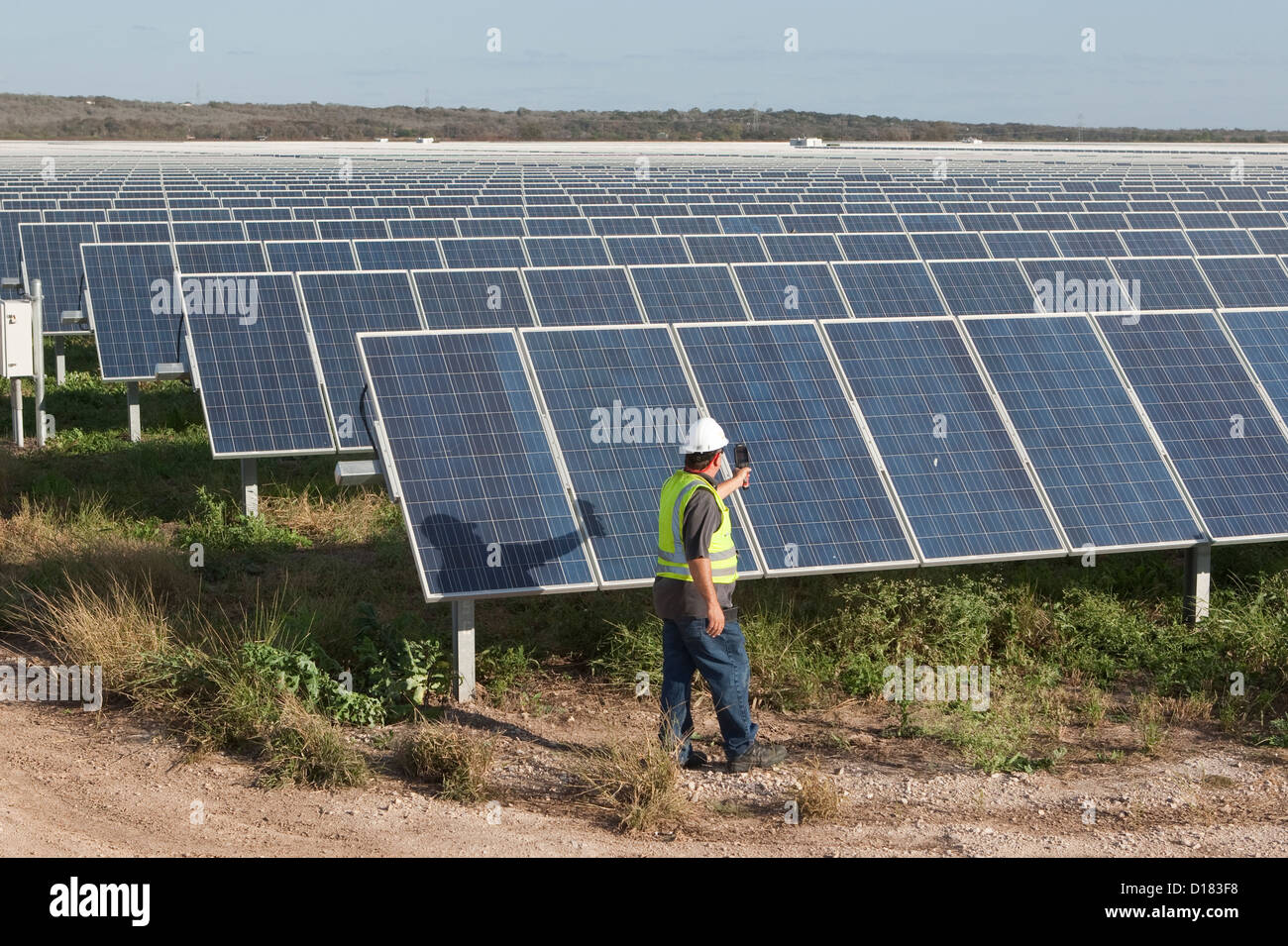 White male uses thermal imaging camera to perform quality control and ...