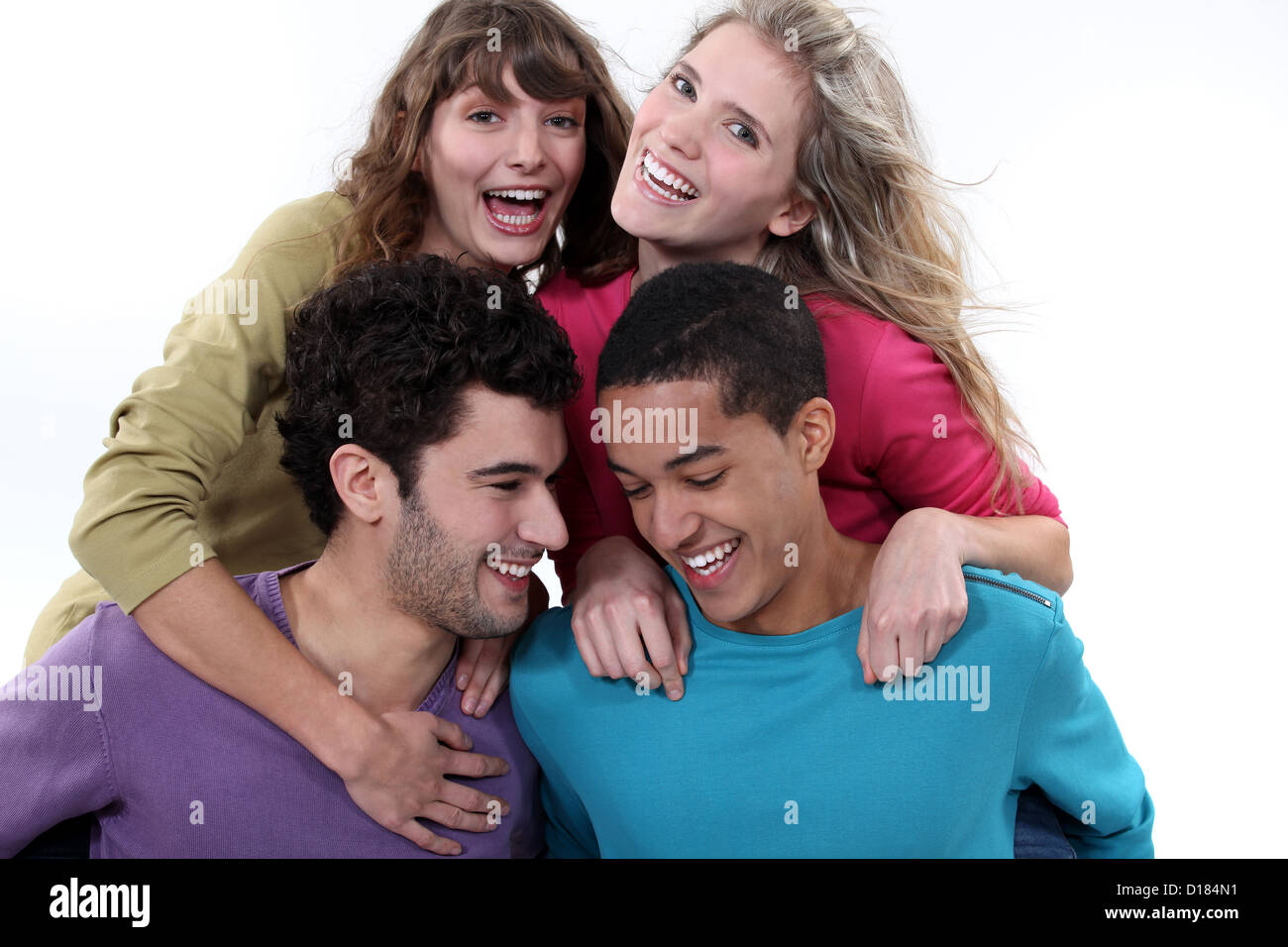 A group of friends laughing together Stock Photo - Alamy