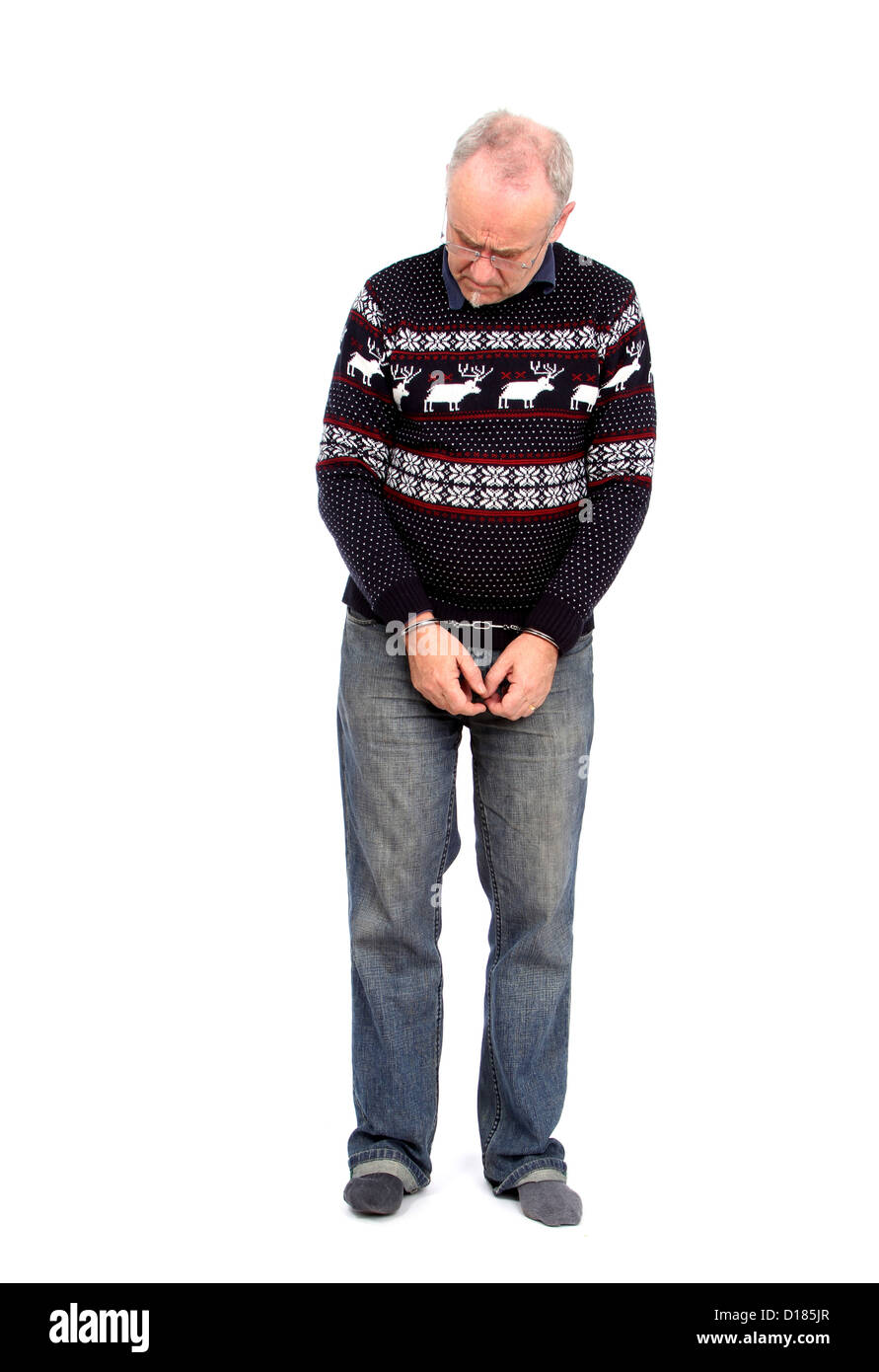 Mature man in Reindeer sweater and handcuffs caught Christmas ...