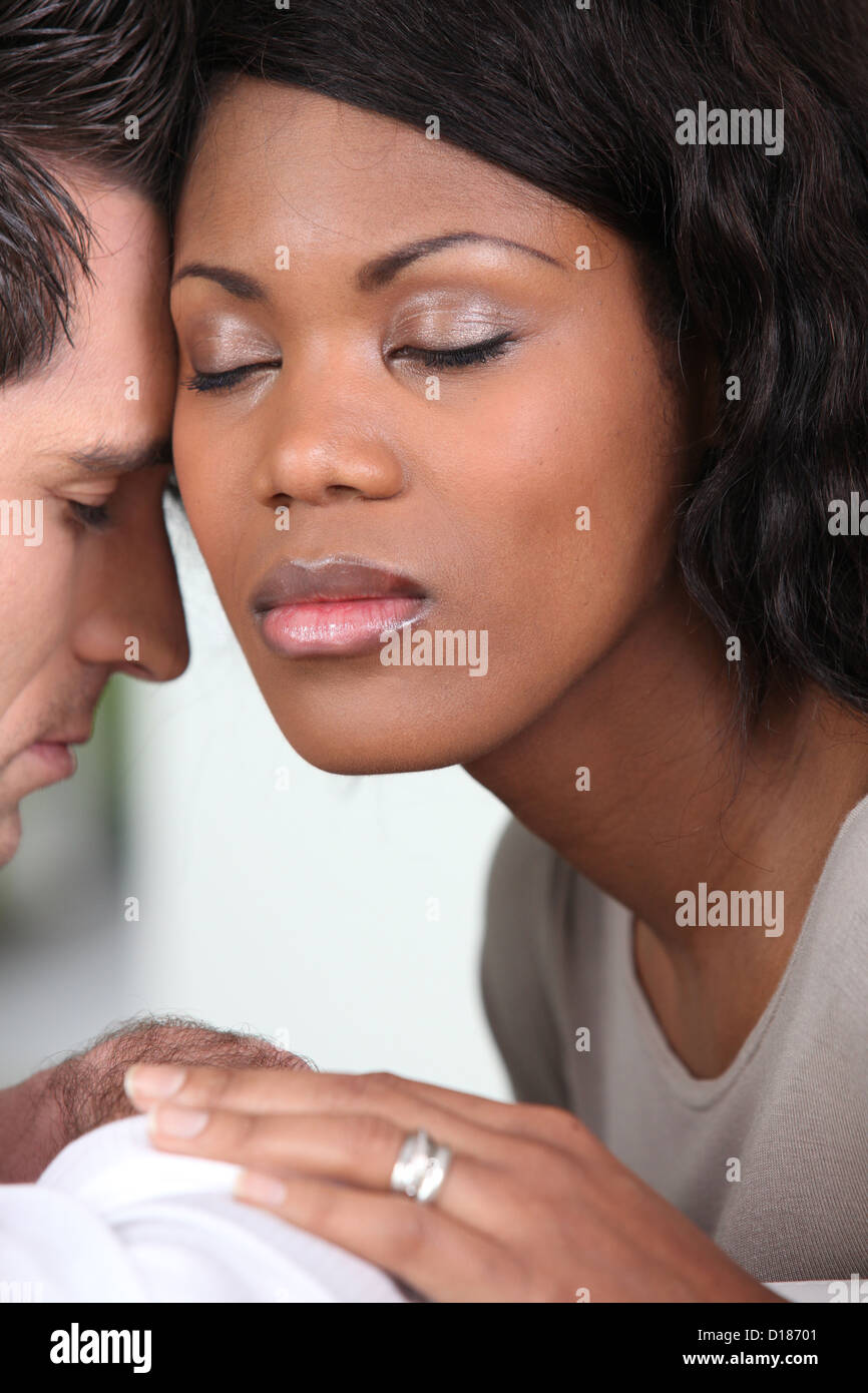 Faces of couple together Stock Photo - Alamy