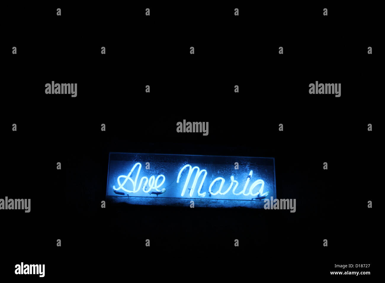 Blue neon ave maria sign hi-res stock photography and images - Alamy