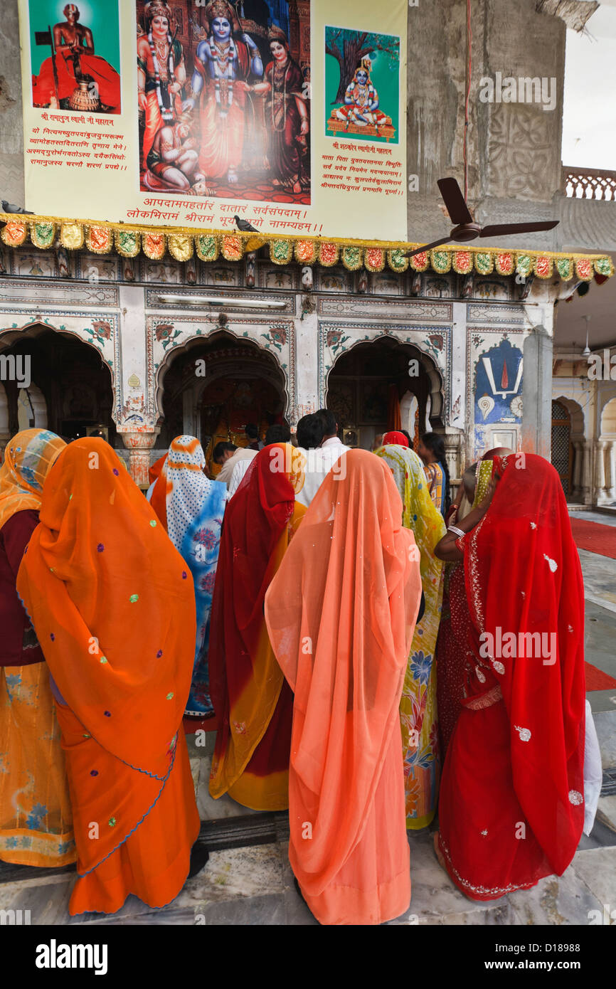 India, Rajasthan, Jaipur, indian women are praying in an hindu temple ...