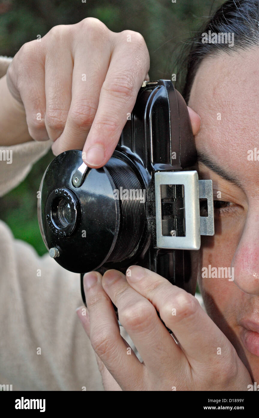 girl using an old 1936 Kodak Bullet film camera uses 127 size film ...