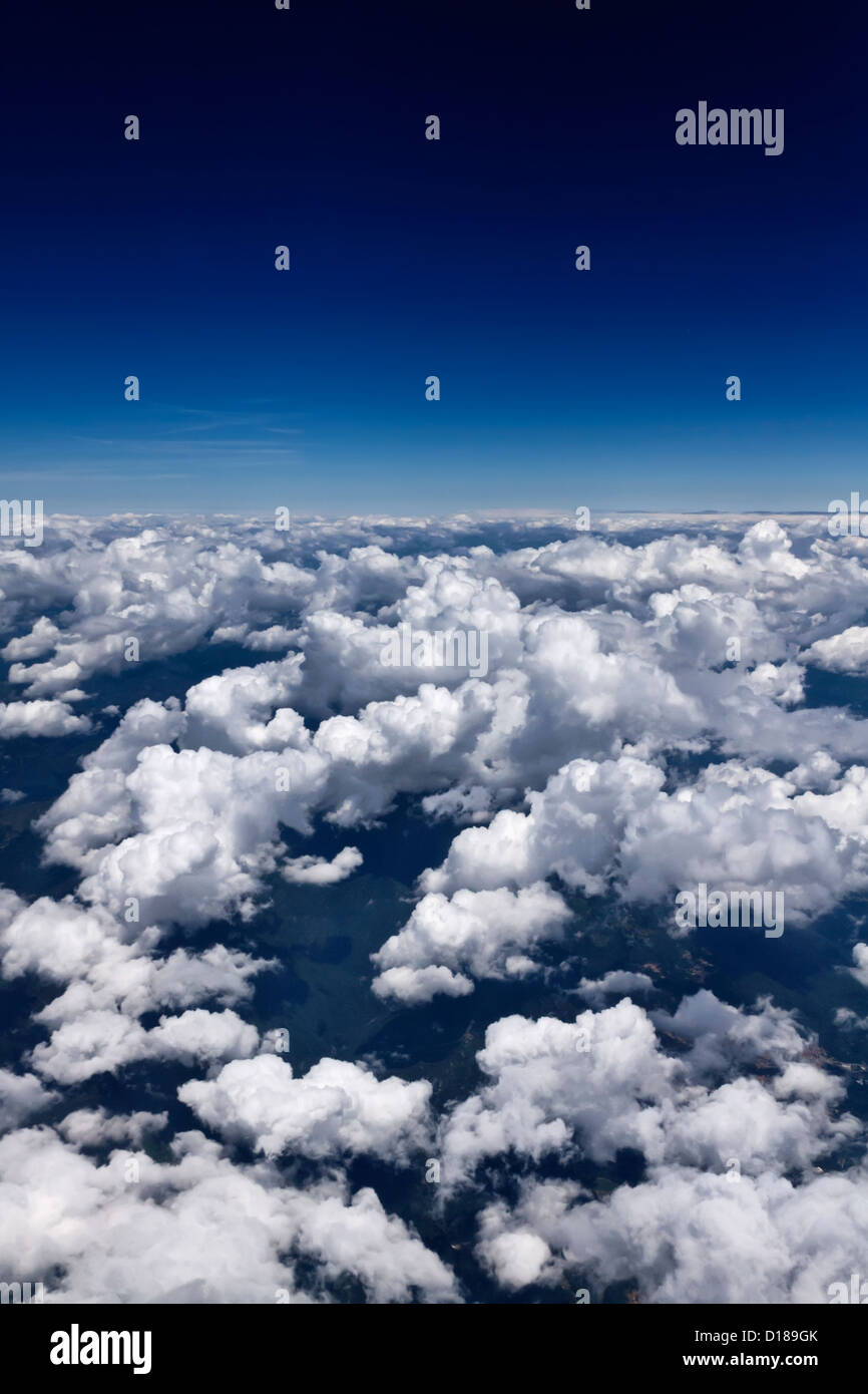 Italy, clouds seen from an airplane window Stock Photo - Alamy
