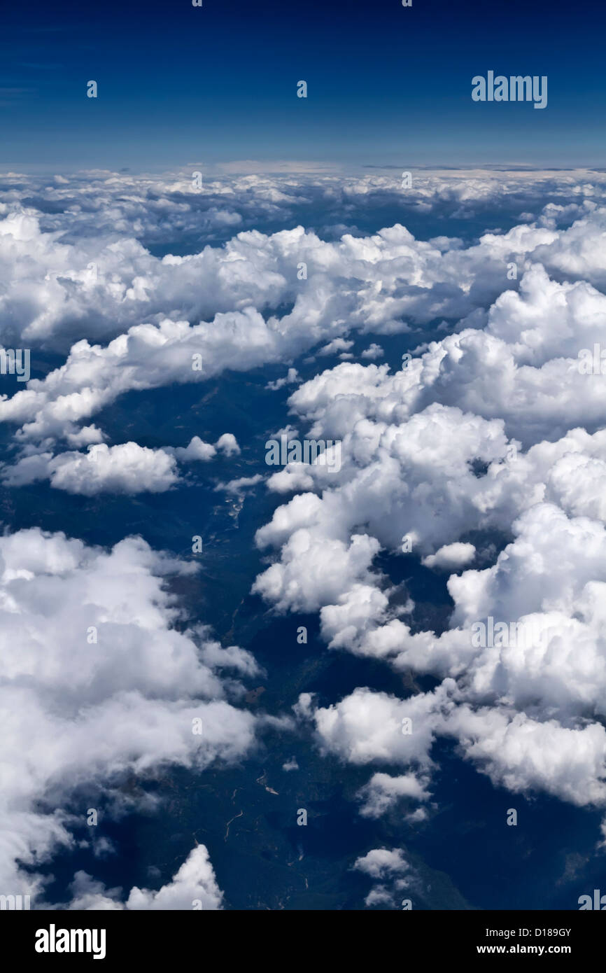 Italy, clouds seen from an airplane window Stock Photo - Alamy