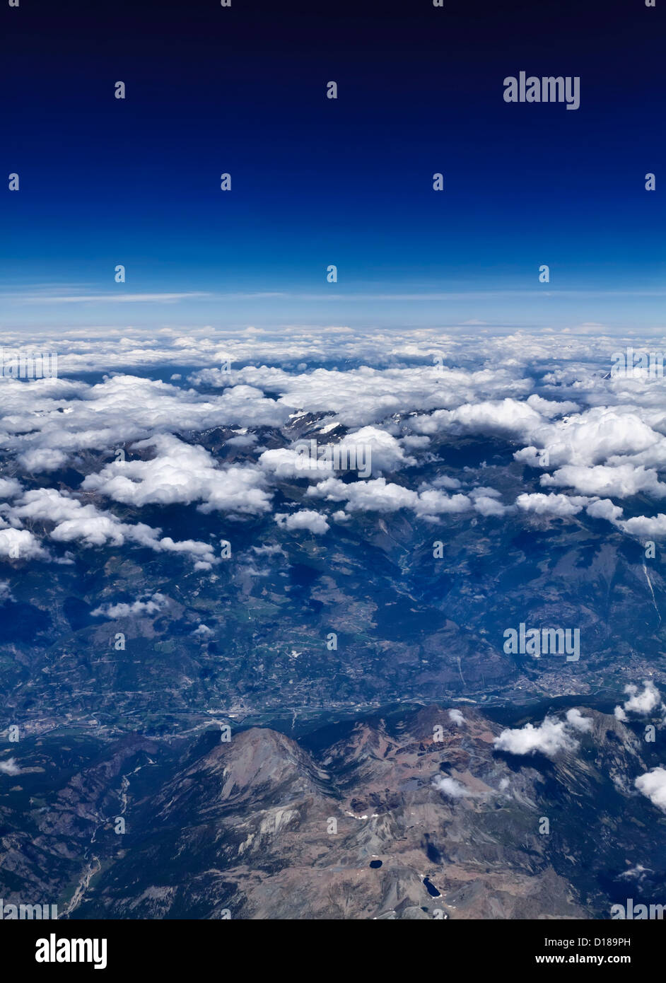 Italy, aerial view of the italian Alps and some clouds Stock Photo - Alamy