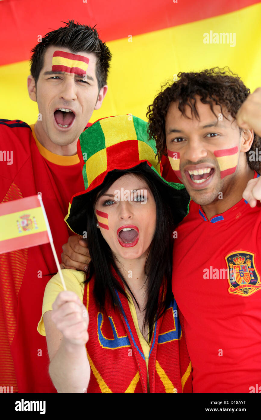 Three Spanish football fans Stock Photo - Alamy