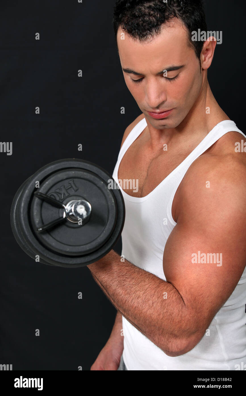 man lifting weight Stock Photo - Alamy