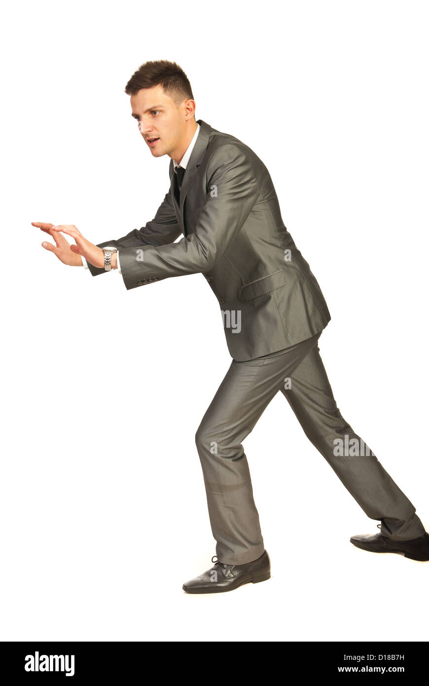 Business man pushing something aside isolated on white background Stock ...