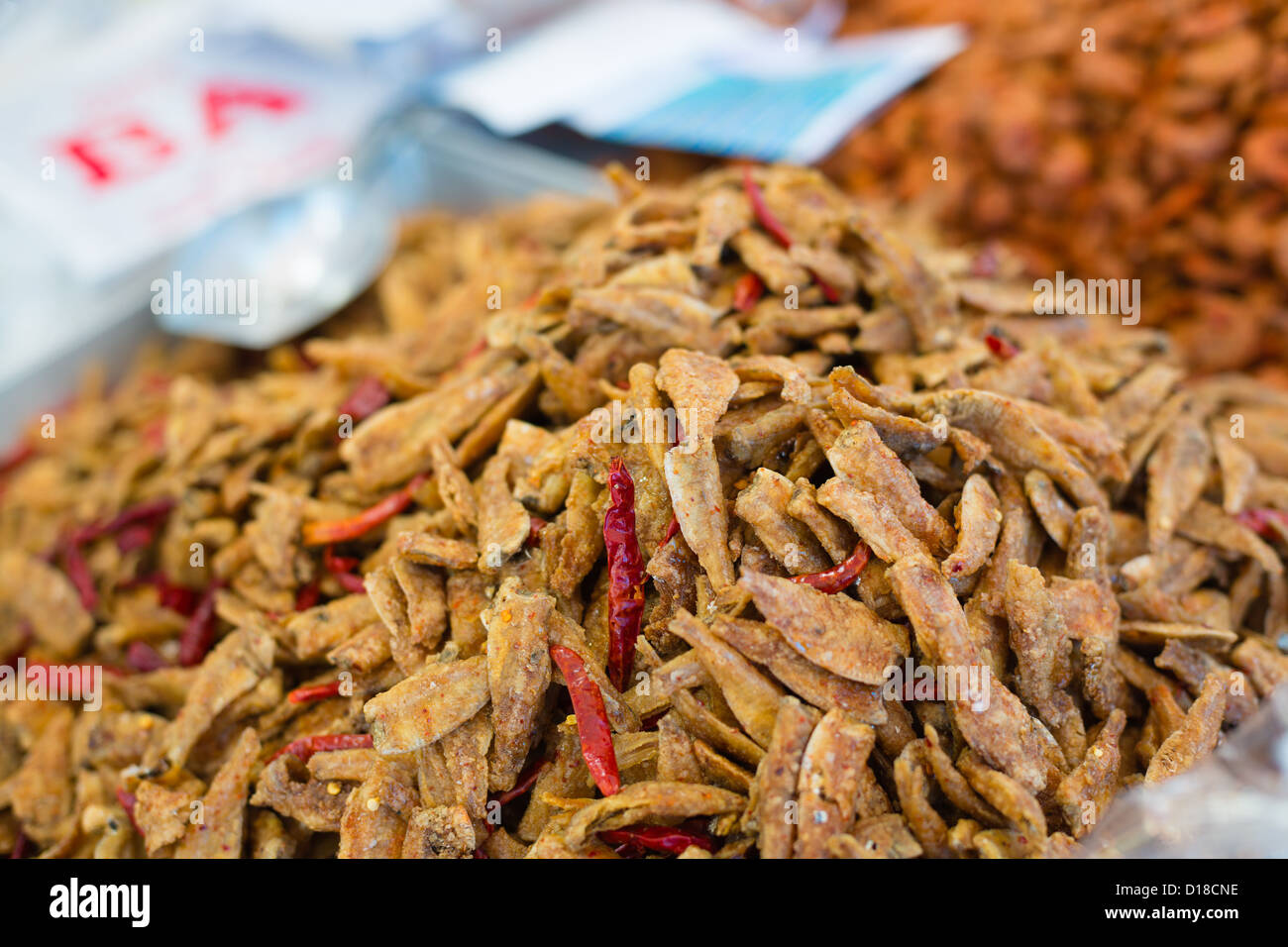 Fried fish with spice snack food of thailand Stock Photo - Alamy