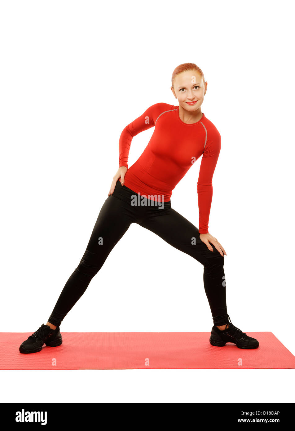 Beautiful slim red fit woman over white background Stock Photo - Alamy