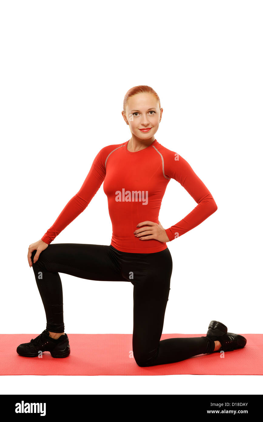 Beautiful slim red fit woman over white background Stock Photo - Alamy