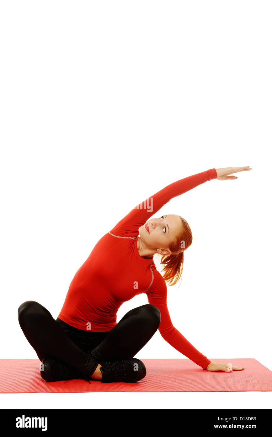 Beautiful slim red fit woman over white background Stock Photo - Alamy