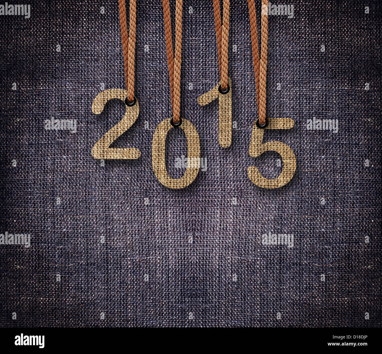 2015 numbers hanging by rope as puppeteer on sackcloth background Stock ...
