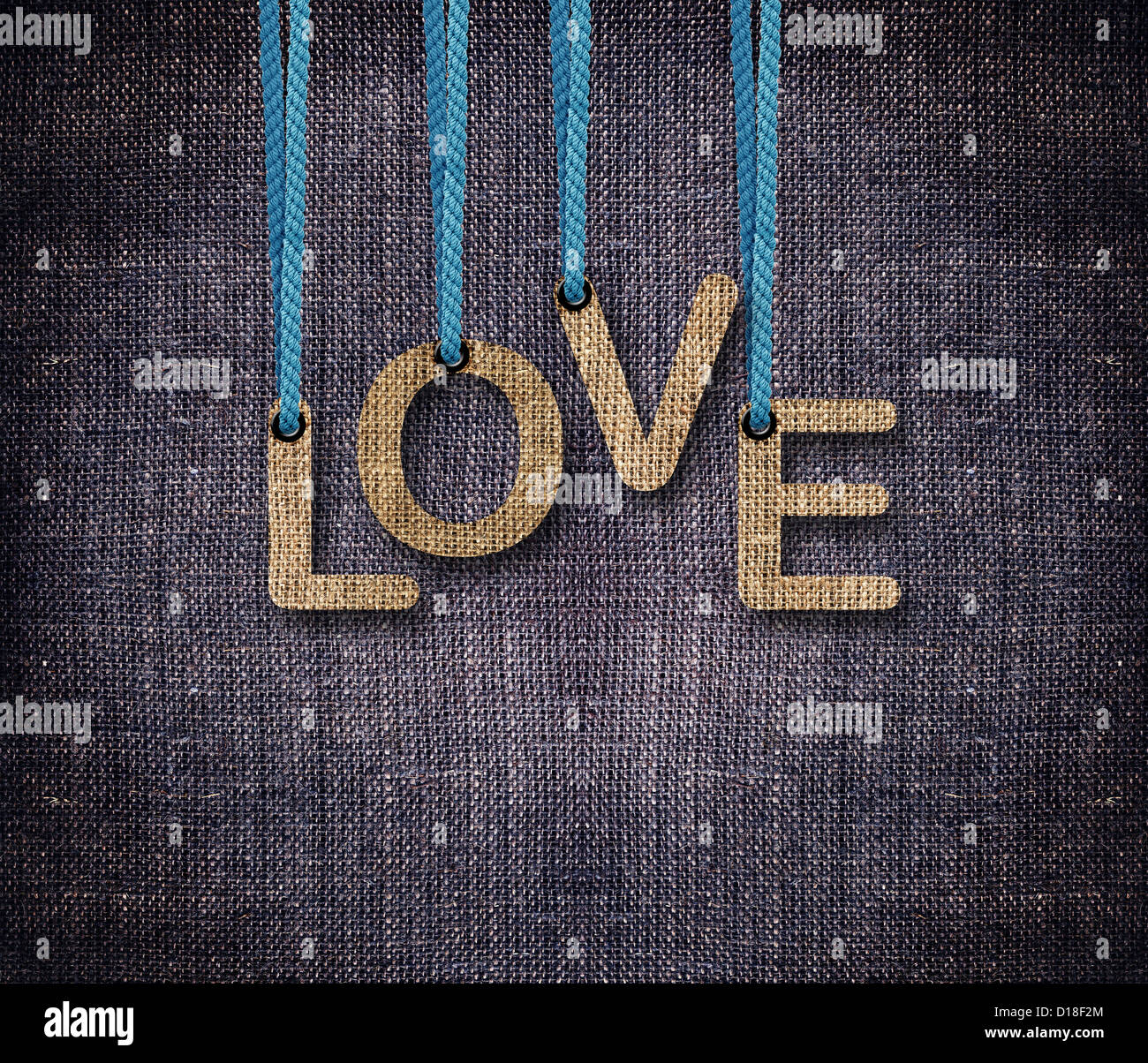 Love word hanging by rope as puppeteer on sackcloth background Stock ...