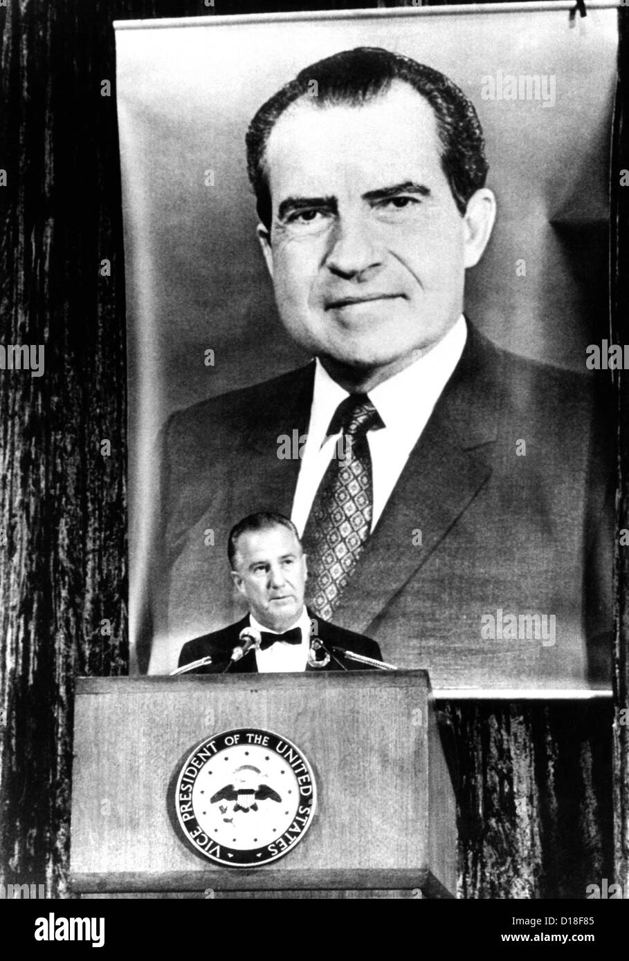 A huge portrait of President Nixon dominates the scene. Vice President ...