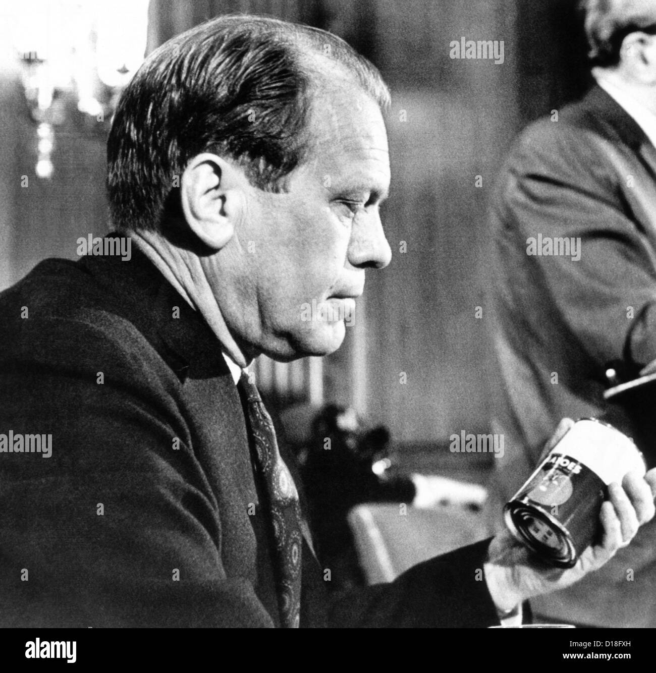 House Republican leader Gerald Ford, decries inflation in a press ...