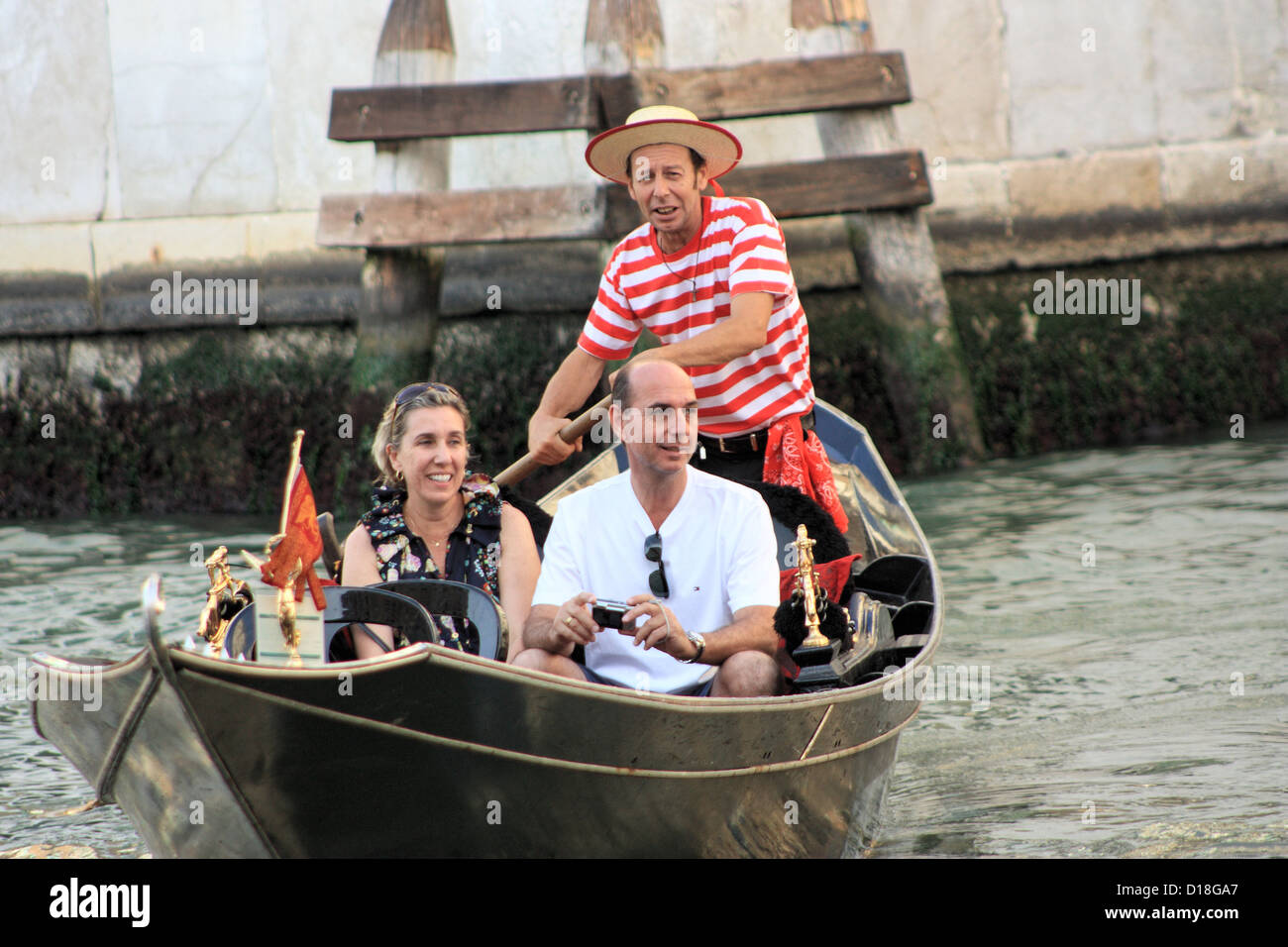 Funny gondola ride in Venice Stock Photo - Alamy