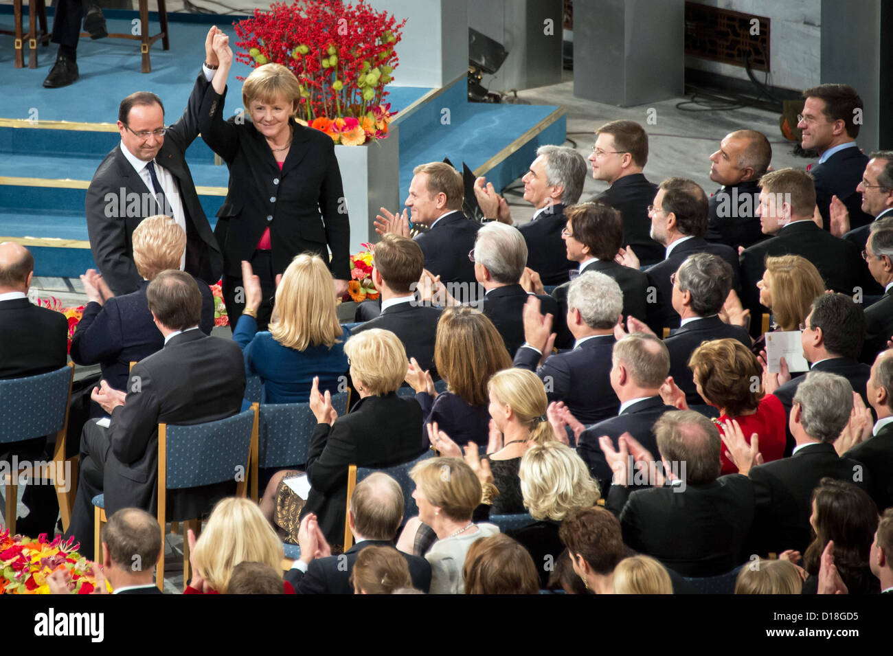 A handout picture shows German chancellor Angela Merkel (r) and French ...