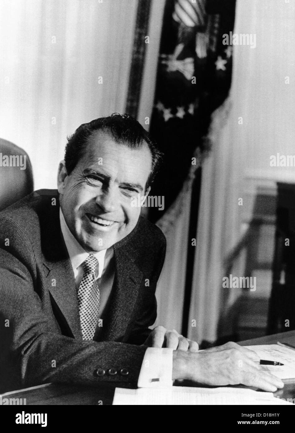 President Richard Nixon at his Oval Office desk on his first full day ...