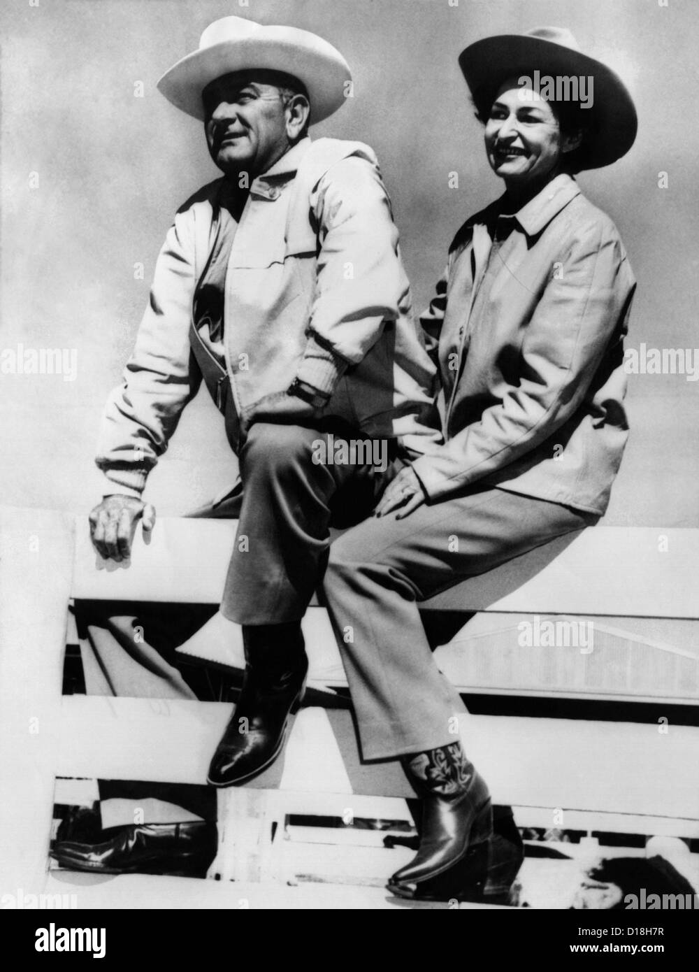 President Lyndon Johnson in a field with some of the Hereford cattle ...