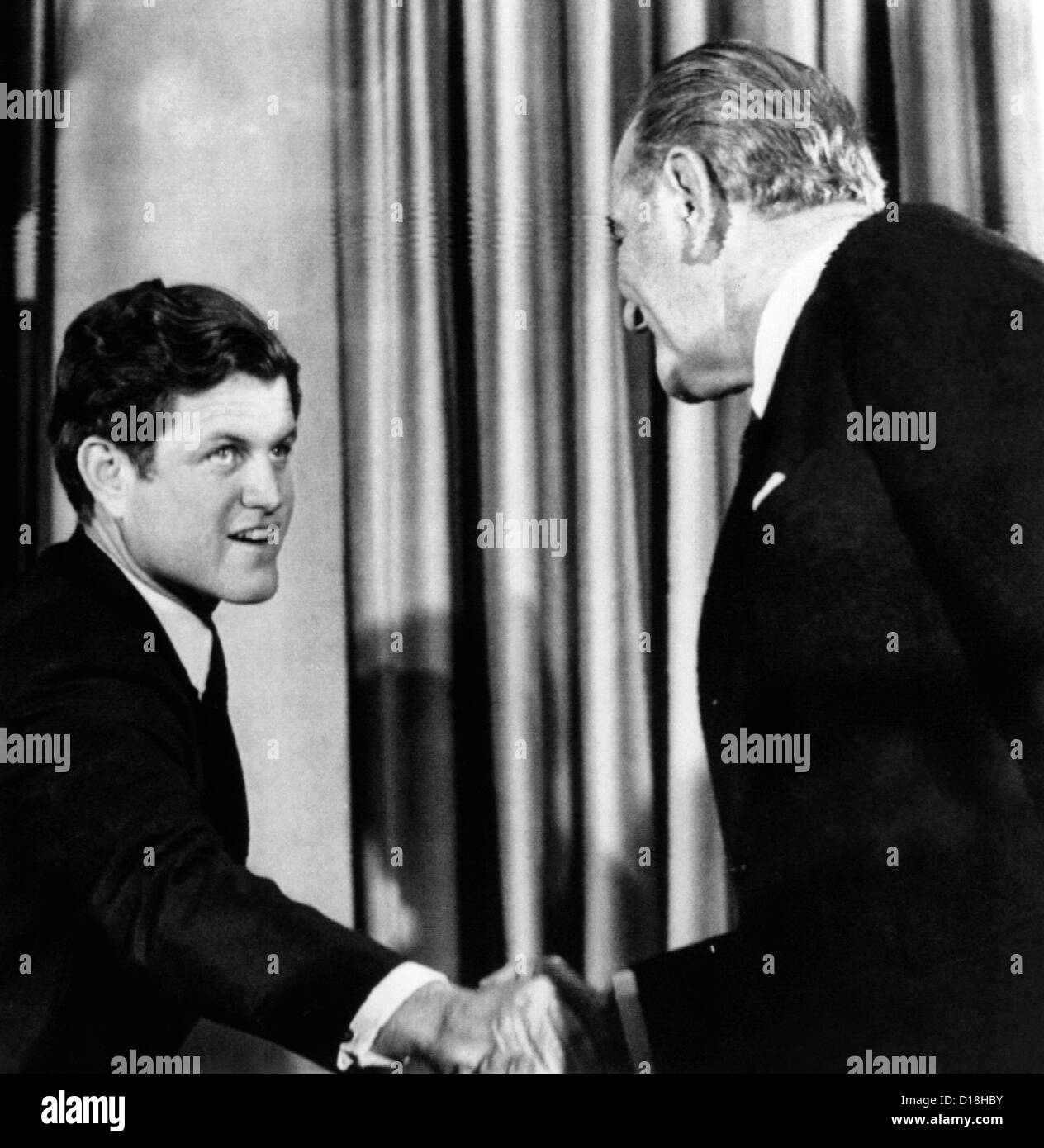 President Lyndon Johnson shakes the hand of Senator Edward Kennedy. LBJ ...