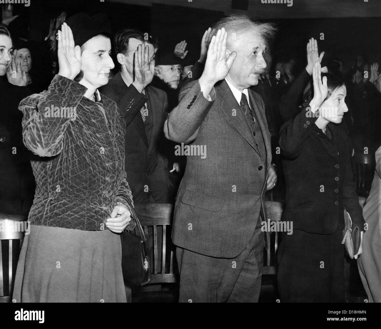 Albert Einstein taking his oath of citizenship. Also taking swearing ...