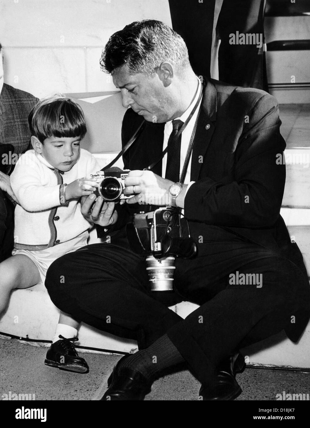 John F. Kennedy Jr. takes an interest in the cameras of White House ...
