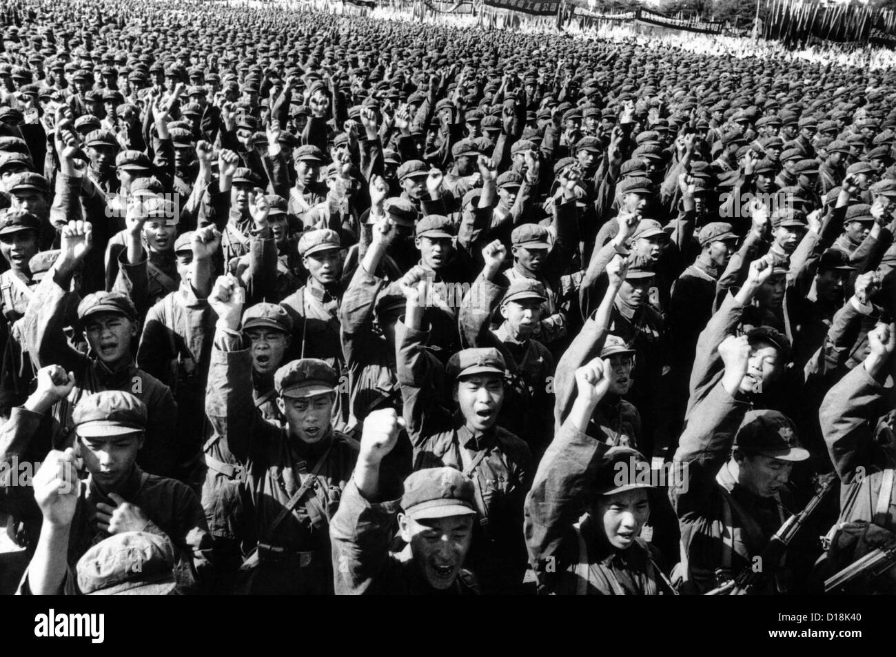 Thousands of Red Army soldiers raise their clenched fists. They pledged ...