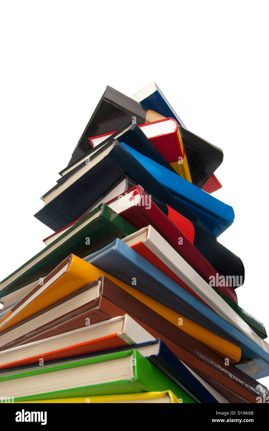 Hardcover Books stacked one over the other isolated on white with copy ...