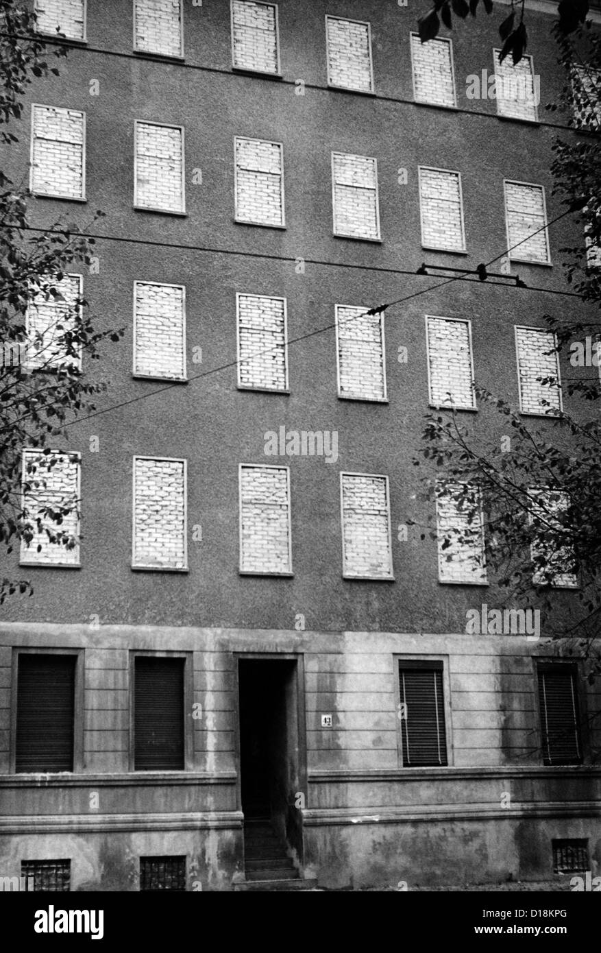 Bricked up windows of building along the Berlin Wall on the border of ...