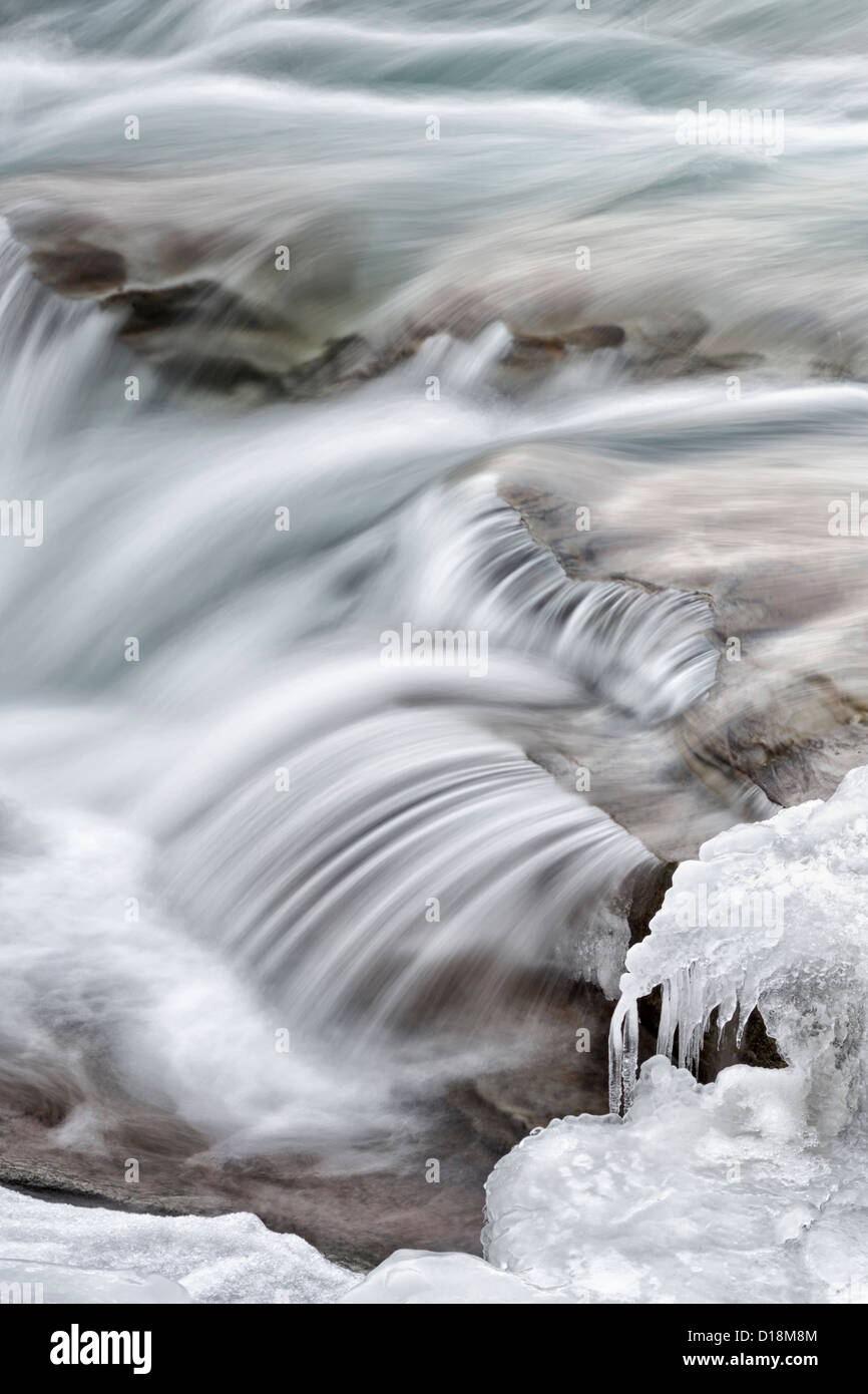 A frozen Athabasca Falls in Canada's Jasper National park Stock Photo ...