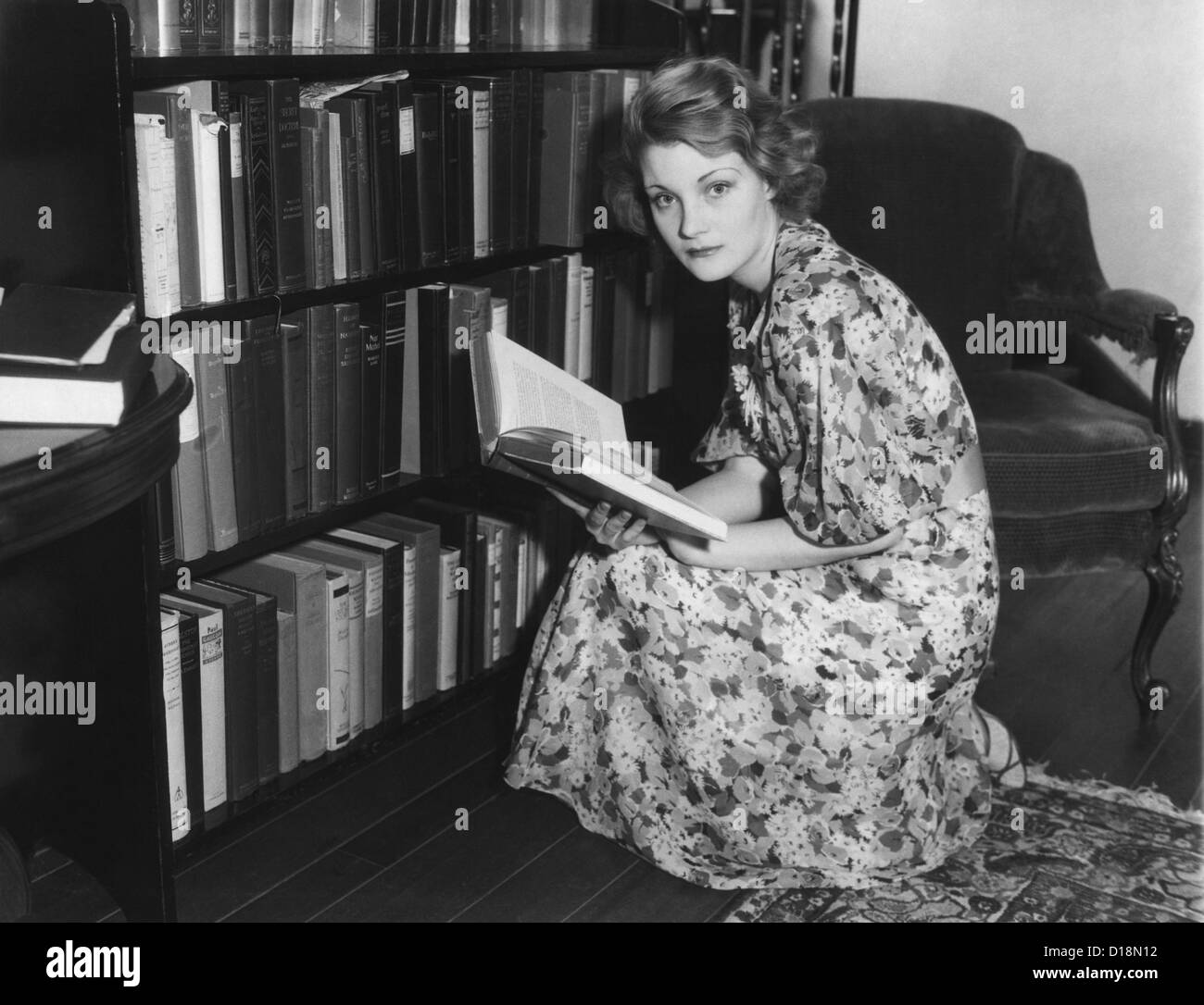 Old library book woman Black and White Stock Photos & Images - Alamy