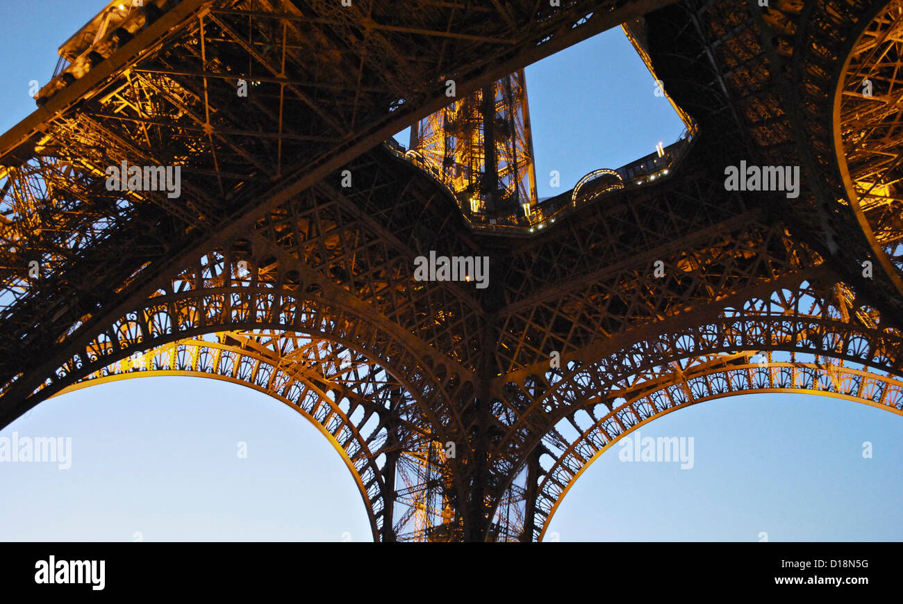 The Eiffel tower from the bottom at the sunset Stock Photo - Alamy