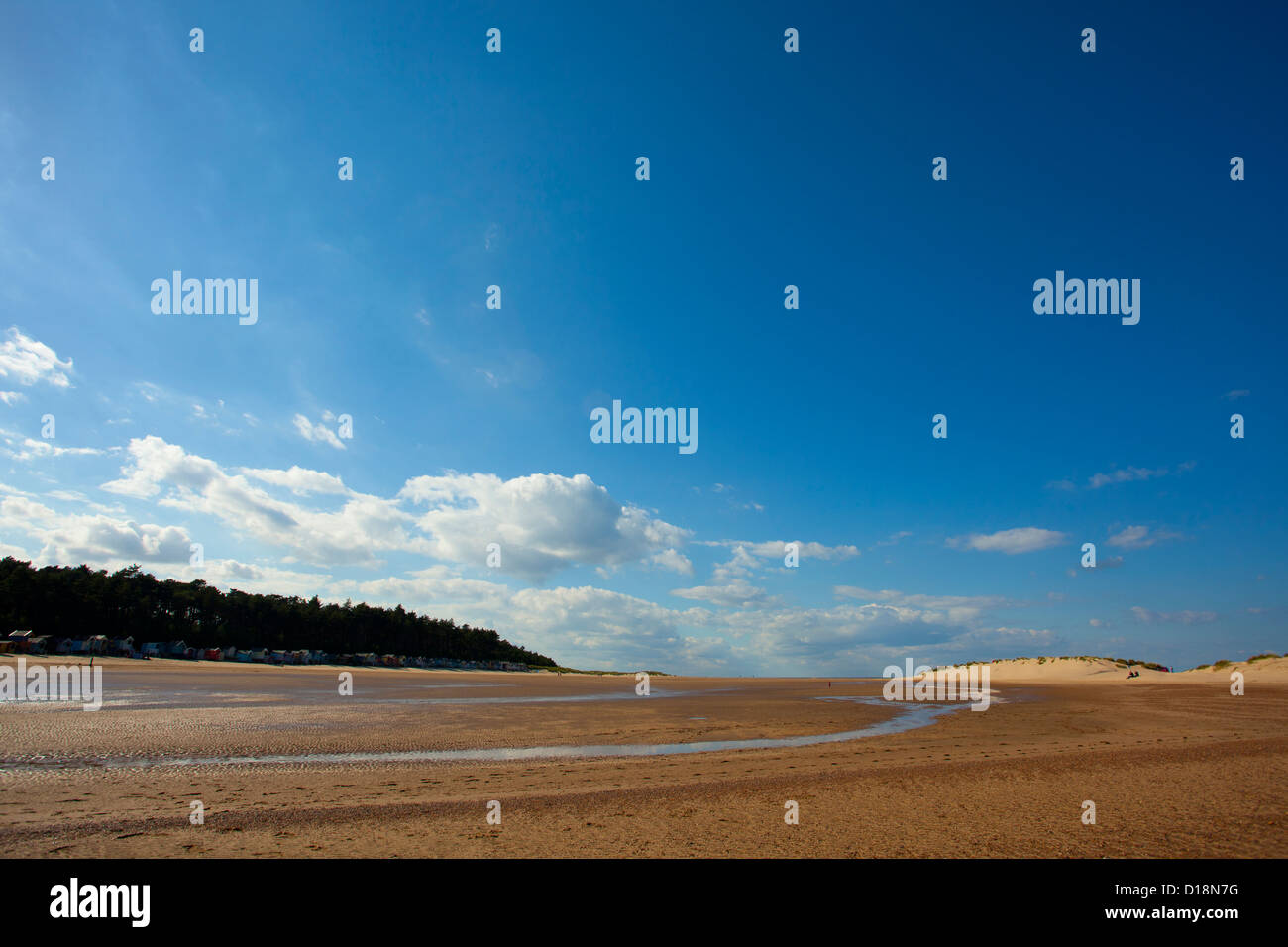 Beach and blue sky Stock Photo - Alamy
