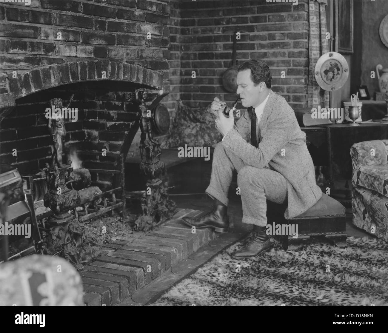 Seated pipe smoker hi-res stock photography and images - Alamy