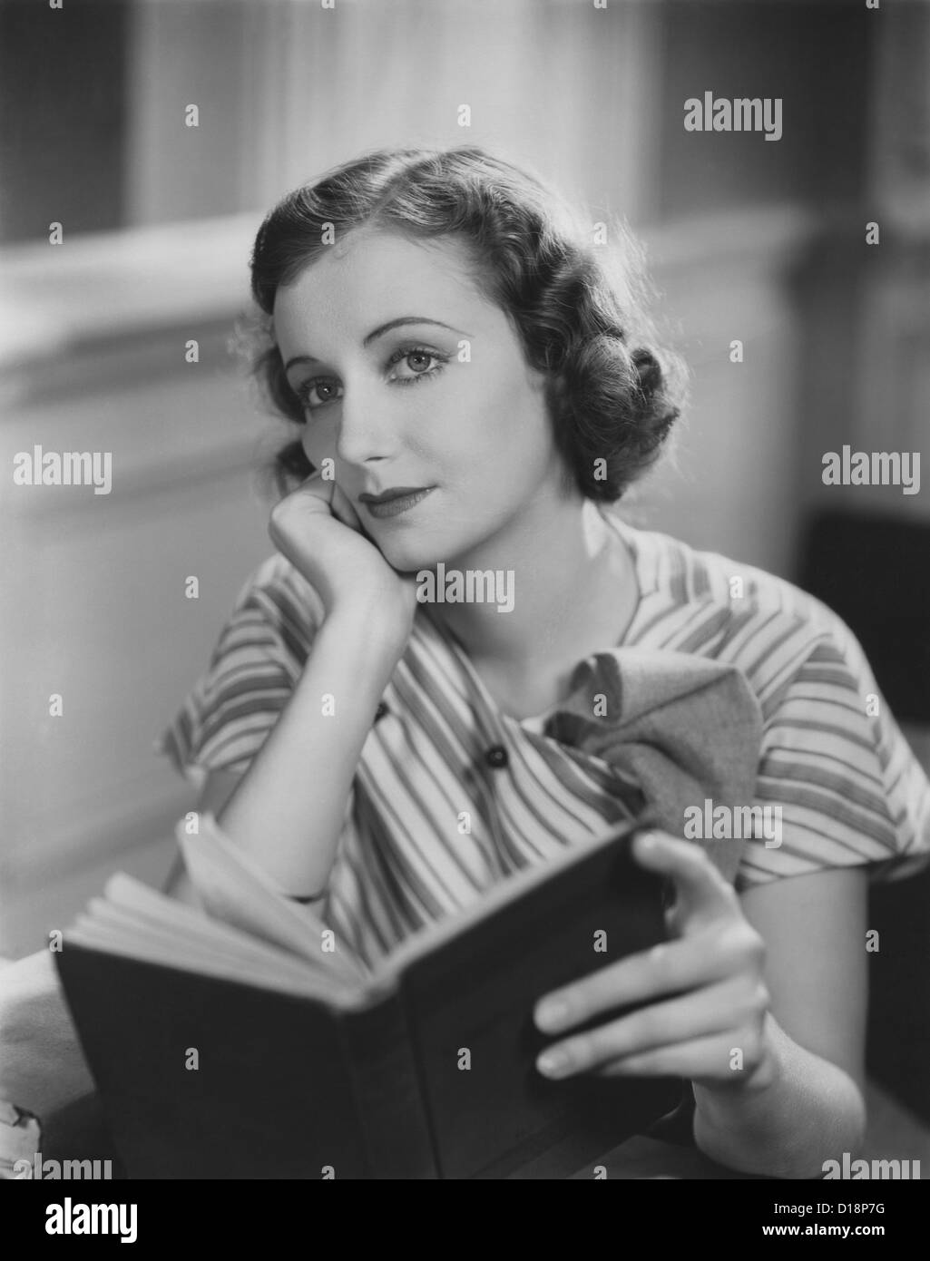 1930s style woman book hi-res stock photography and images - Alamy
