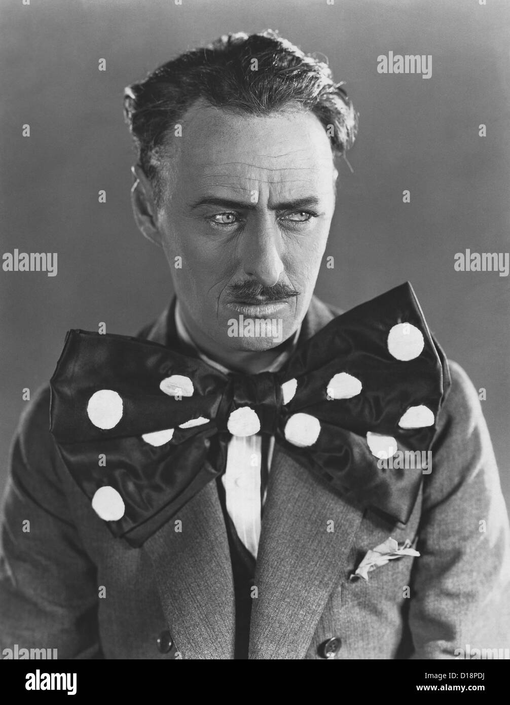 Serious man bow tie Black and White Stock Photos & Images - Alamy