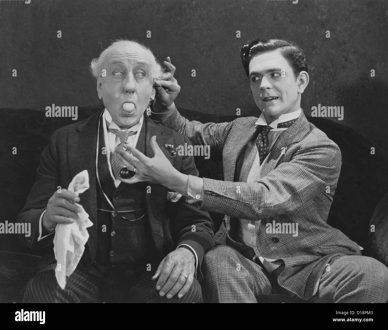 Magician sitting Black and White Stock Photos & Images - Alamy