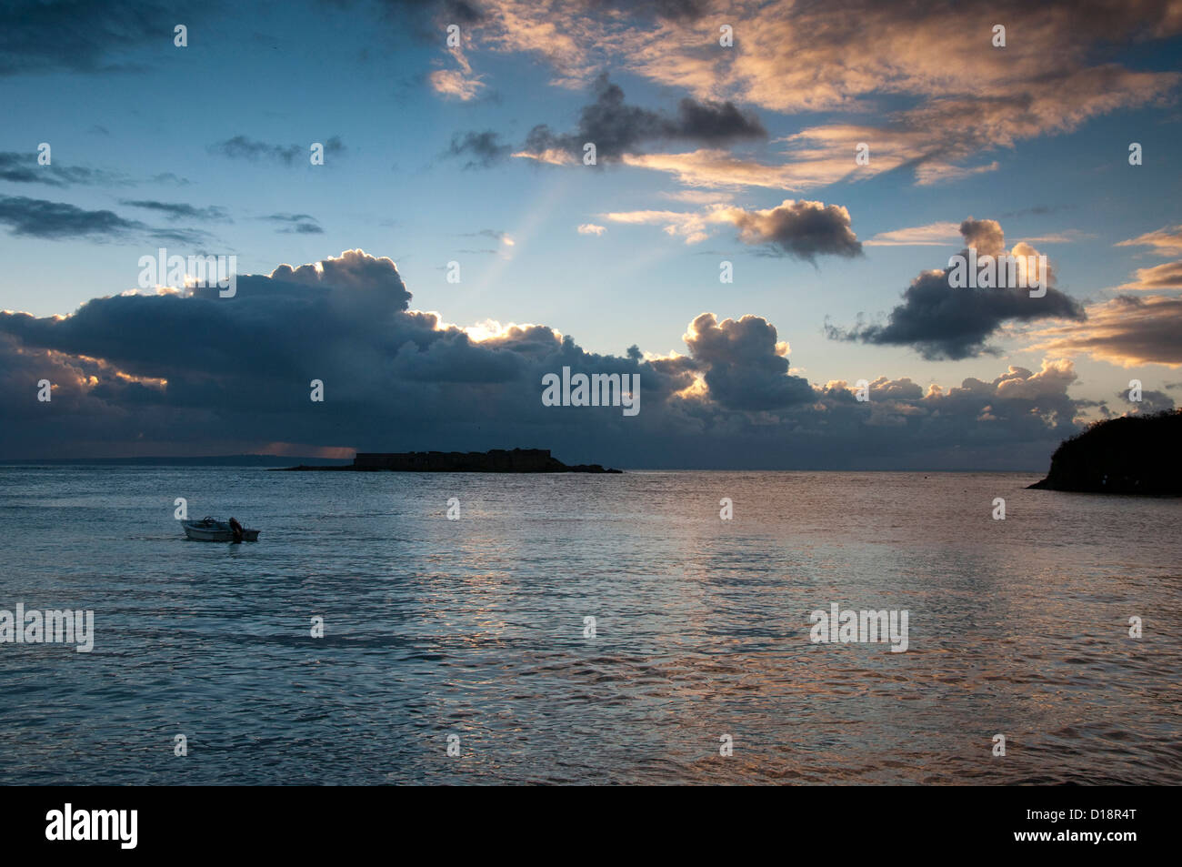 Sunrise over Fort Raz in Longis Bay Alderney, Channel Islands Stock ...