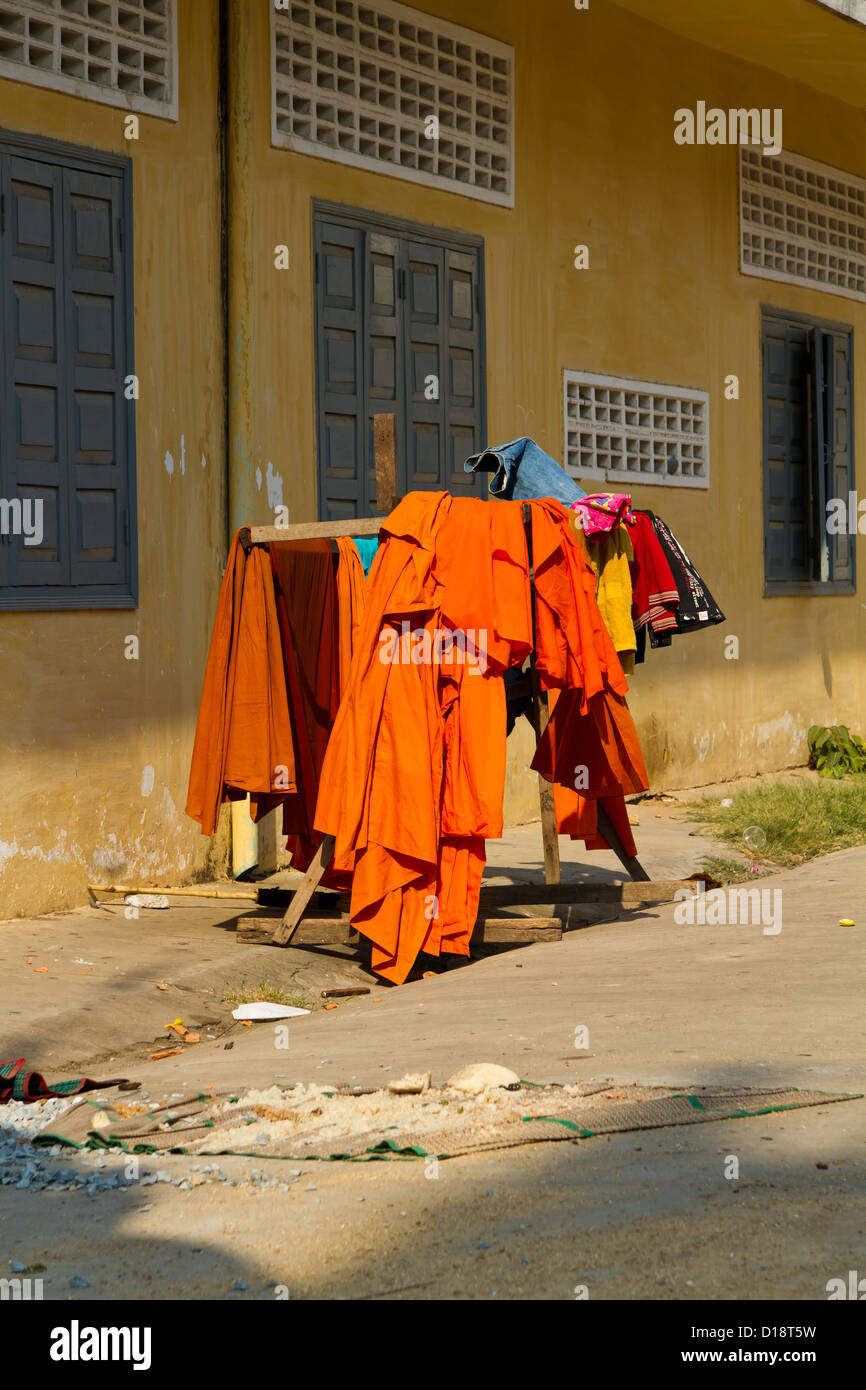Orange Monk Coats hung out to dry in Phnom Penh, Cambodia Stock Photo ...