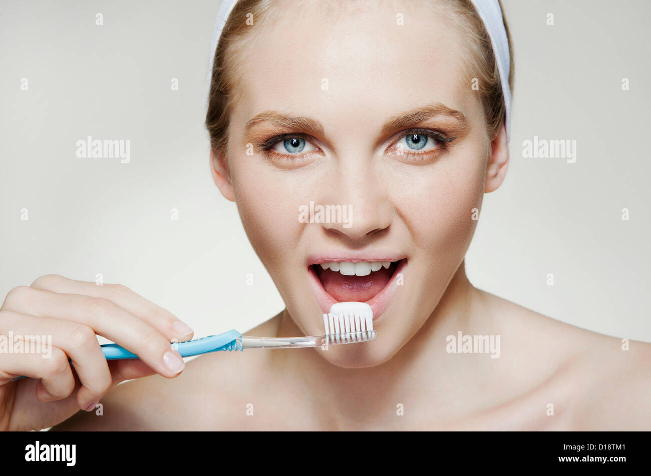 Woman brushing teeth Stock Photo - Alamy
