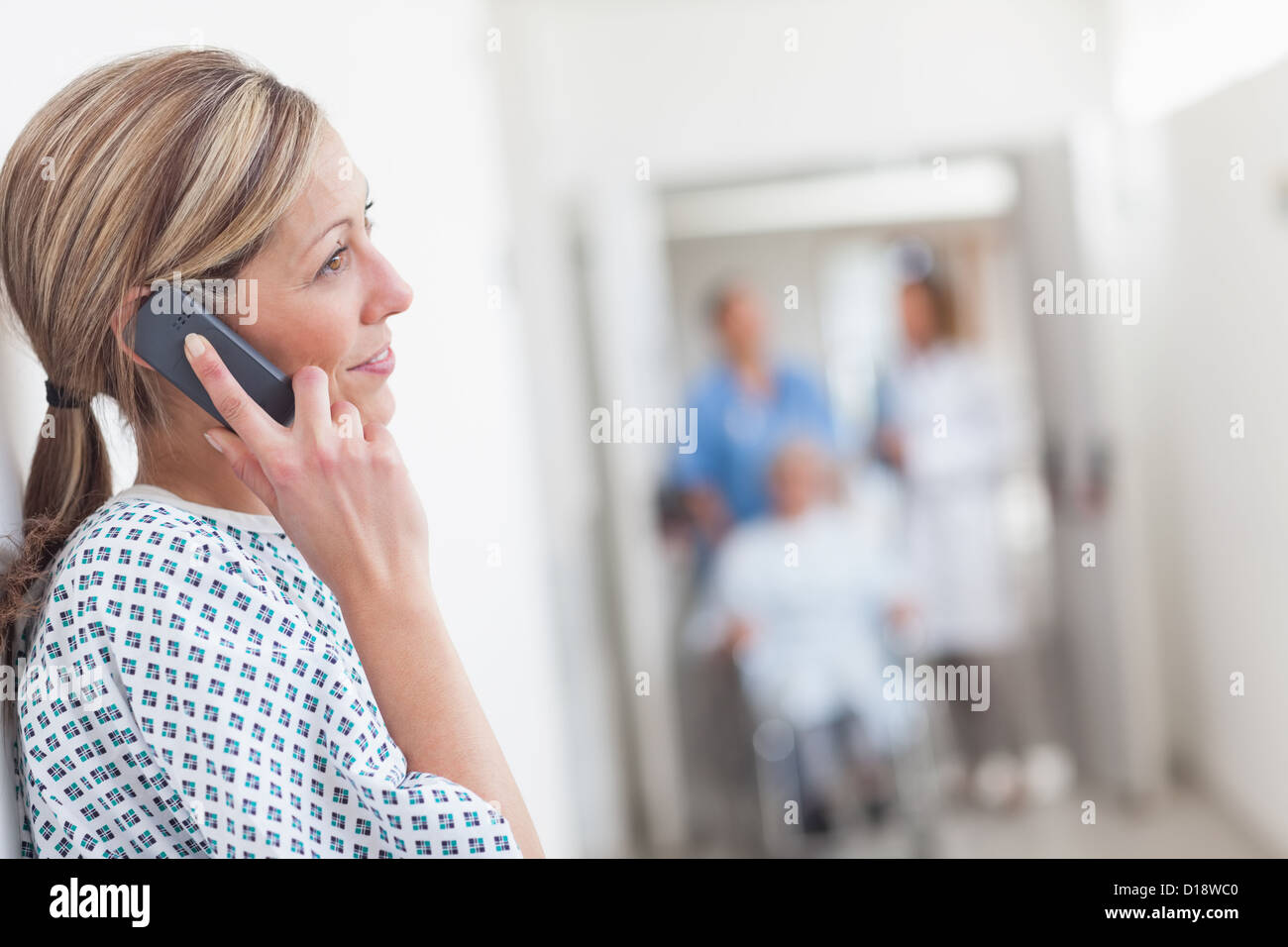 Patient calling in a hospital corridor Stock Photo - Alamy