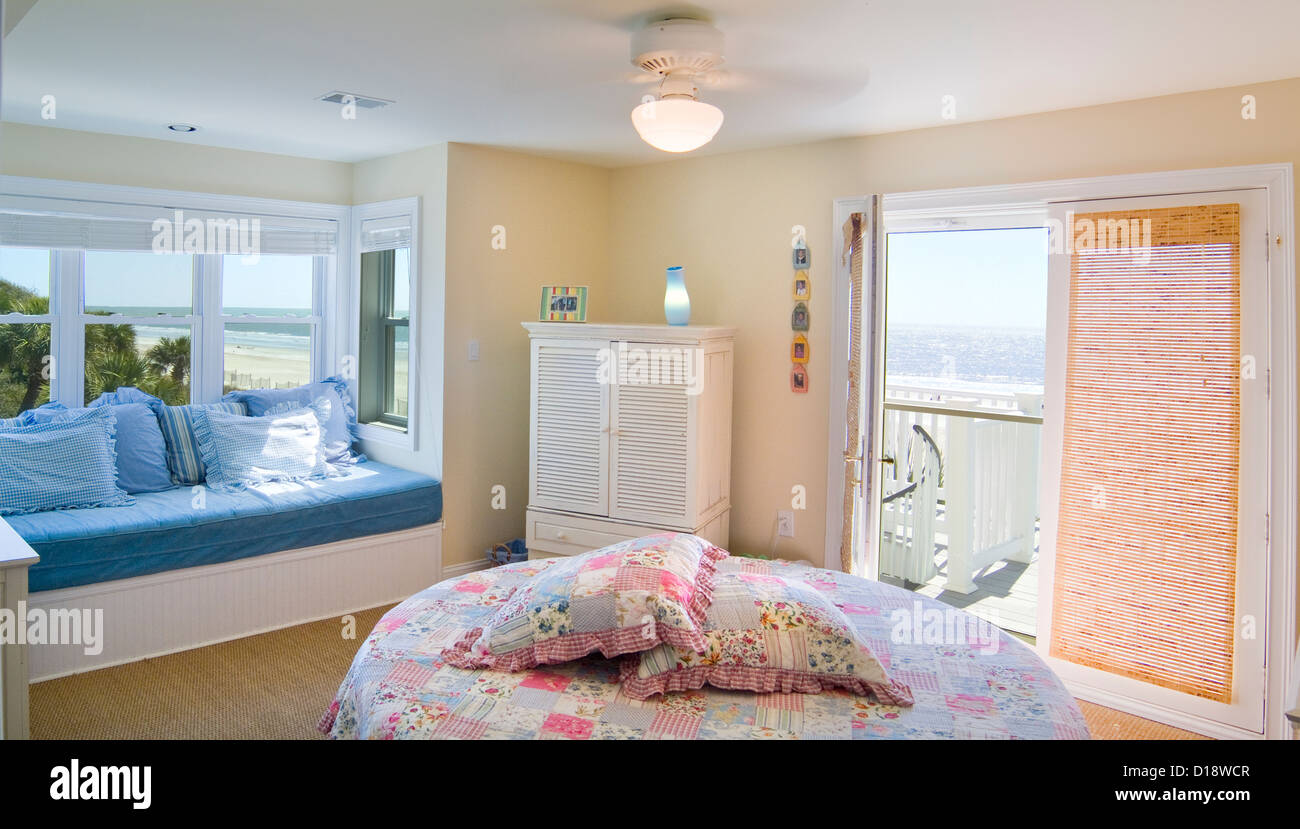 Bedroom With Window Seat & Ocean View Stock Photo - Alamy