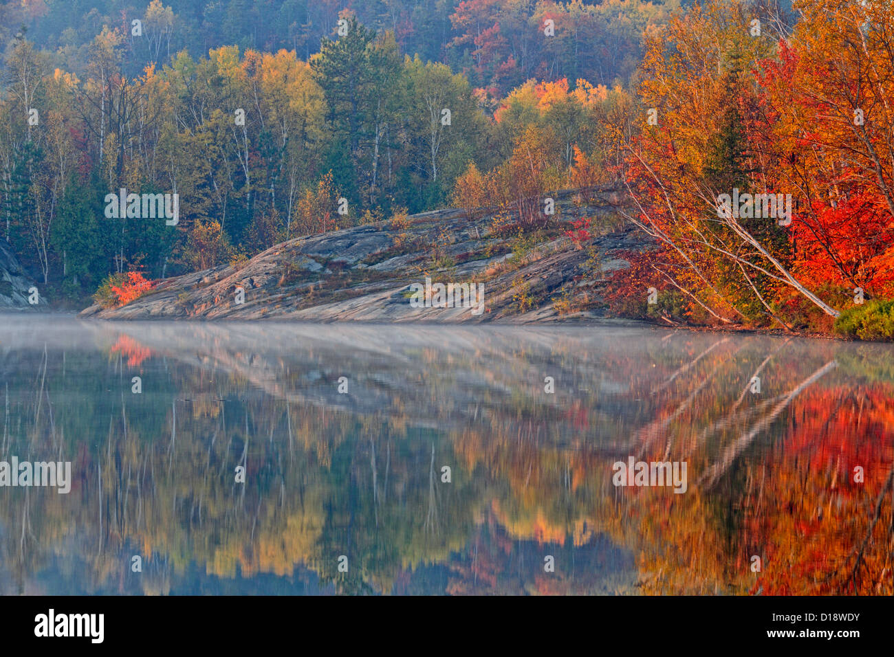 Simon Lake with morning fog and autumn reflections, Greater Sudbury ...