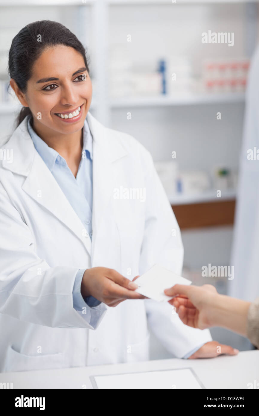 Handing paper hi-res stock photography and images - Alamy